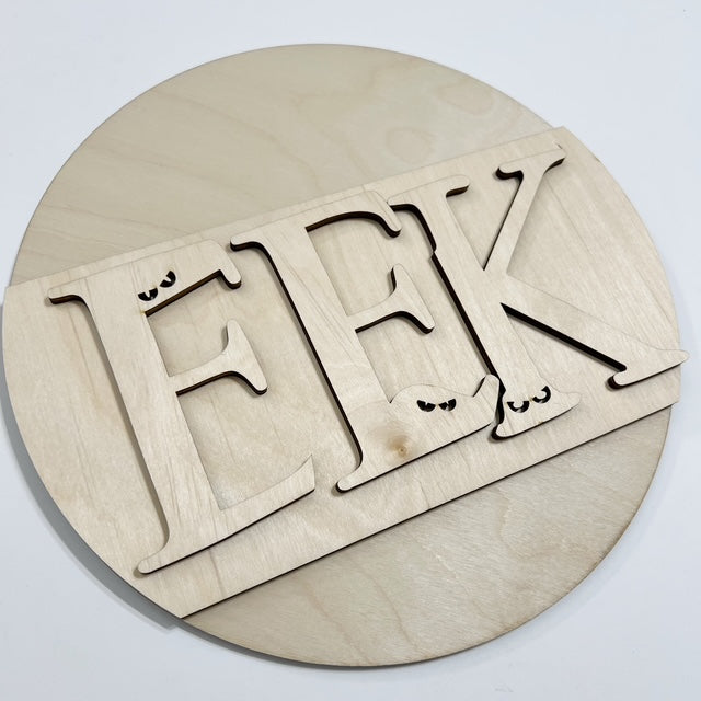 EEK Halloween Spooky Scary Round Doorhanger – Sawdust & Swirls
