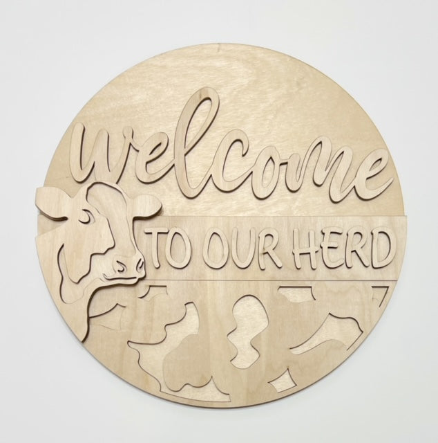 Welcome To Our Herd Cow Print Round Doorhanger – Sawdust & Swirls